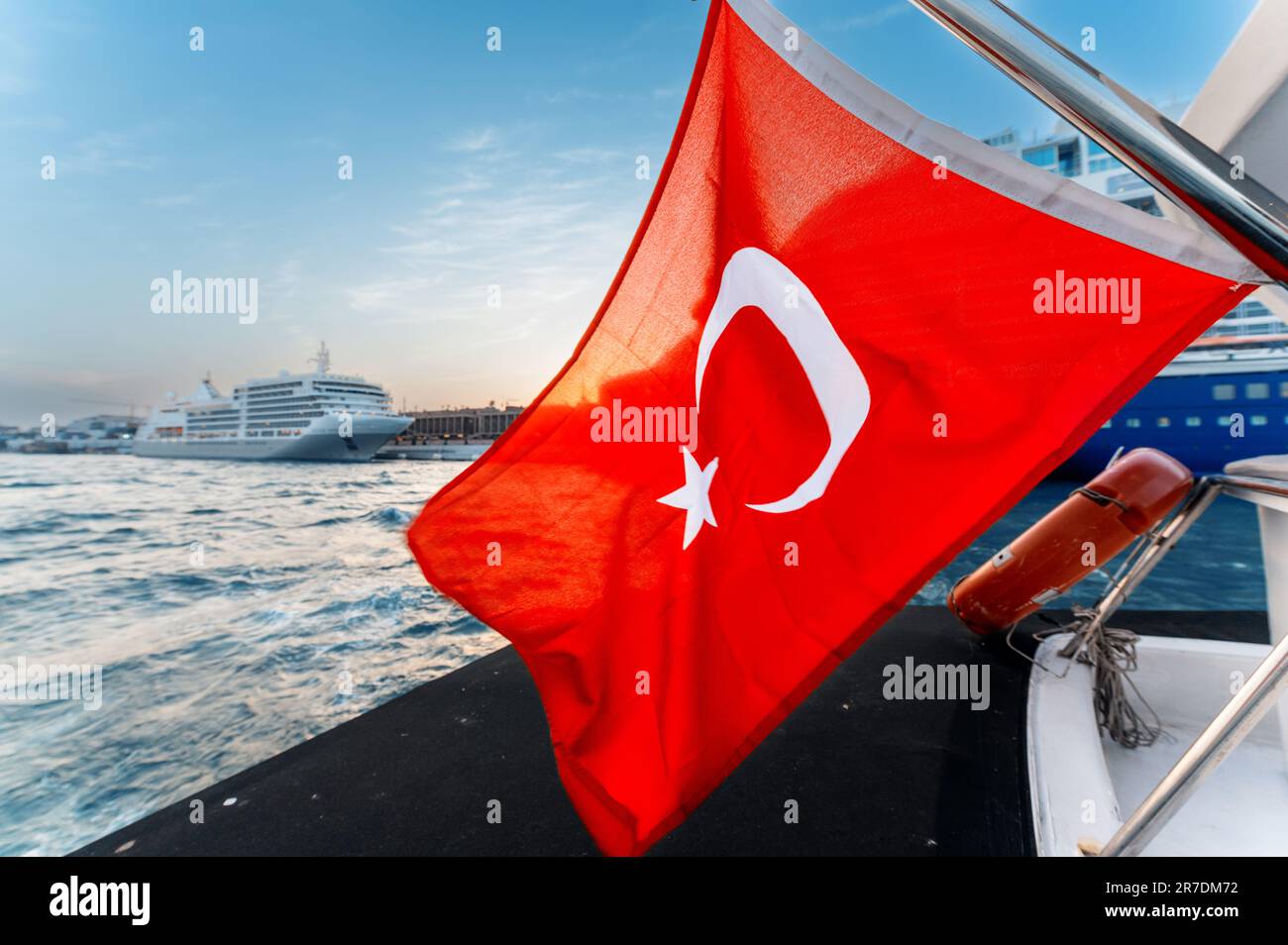 Turkish flag waving on a boat near Cruise Port in Istanbul, Turkey ...