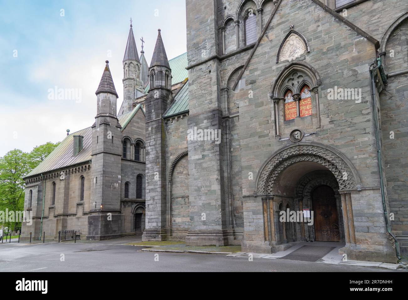 An ornate old church building featuring multiple spires and towers ...