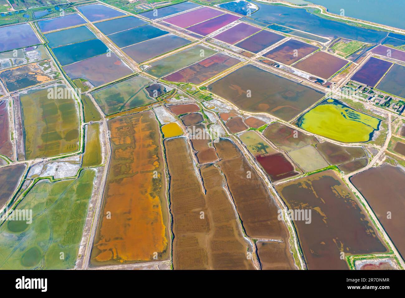 Aerial photo shows the summer scenery of colorful salt lakes in ...