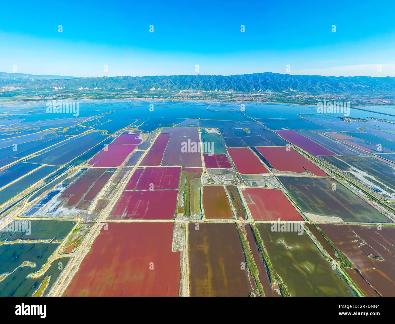 Aerial photo shows the summer scenery of colorful salt lakes in ...