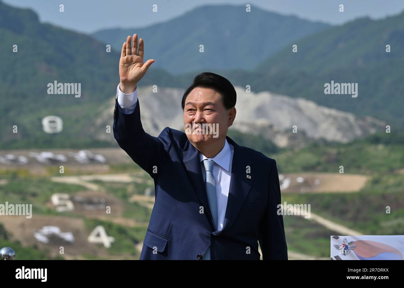 South Korean President Yoon Suk Yeol waves as he delivers a speech ...