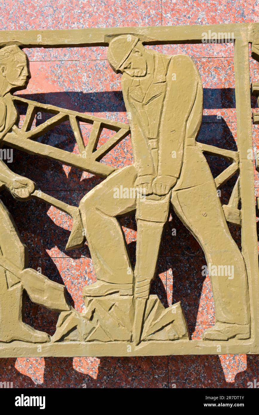 Detail of a panel, showing a construction worker with a jack hammer. At ...