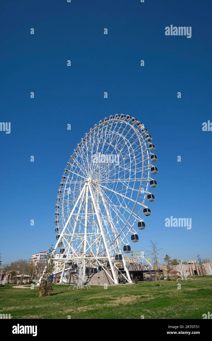 View of the giant, large, big, huge, white, steel ferris wheel ride ...