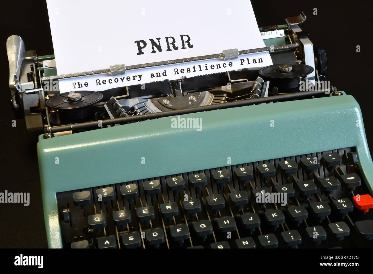 words 'PNRR The National Recovery and Resilience Plan' typed on vintage ...