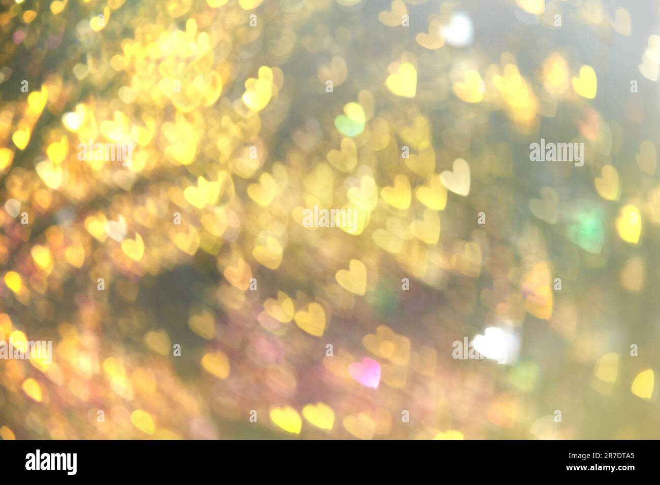 Abstract small hearts flare blur background. Light, hope concept ...