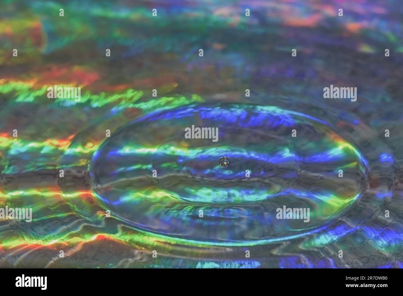 Abstract design. Drop of water and blurry circles.Fantastic ...