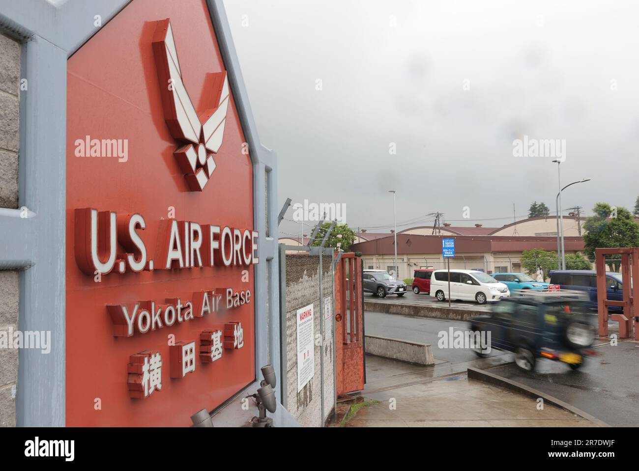 A picture shows the gate of U.S. Yokota Air Base in Tokyo on June 15 ...