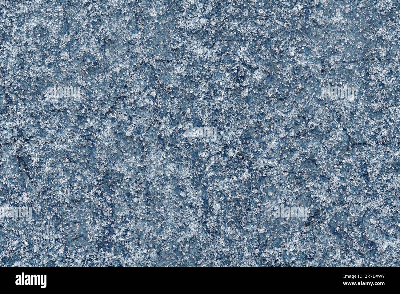 Abstract frozen ice background.Frozen raindrops, freezing rain close-up ...