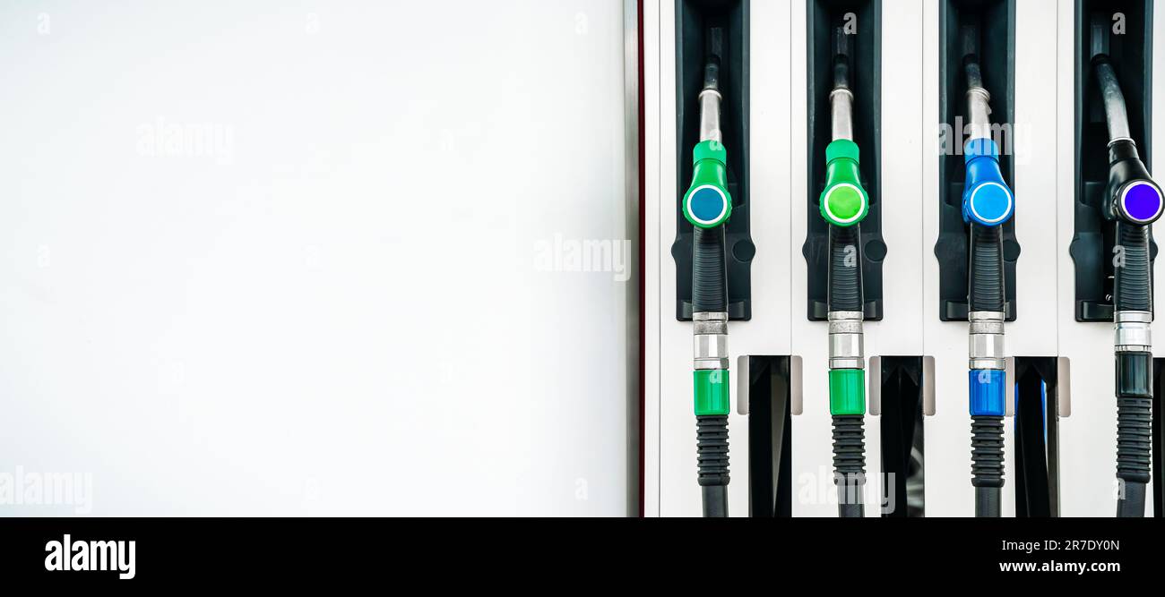 Gas station. Pistols with gasoline and diesel fuel at a car gas station ...