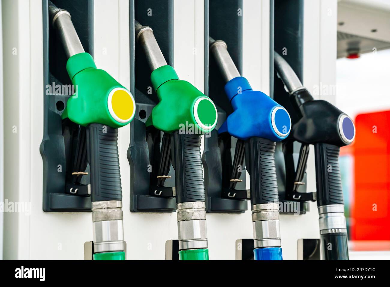 Gas station. Pistols with gasoline and diesel fuel at a car gas station ...