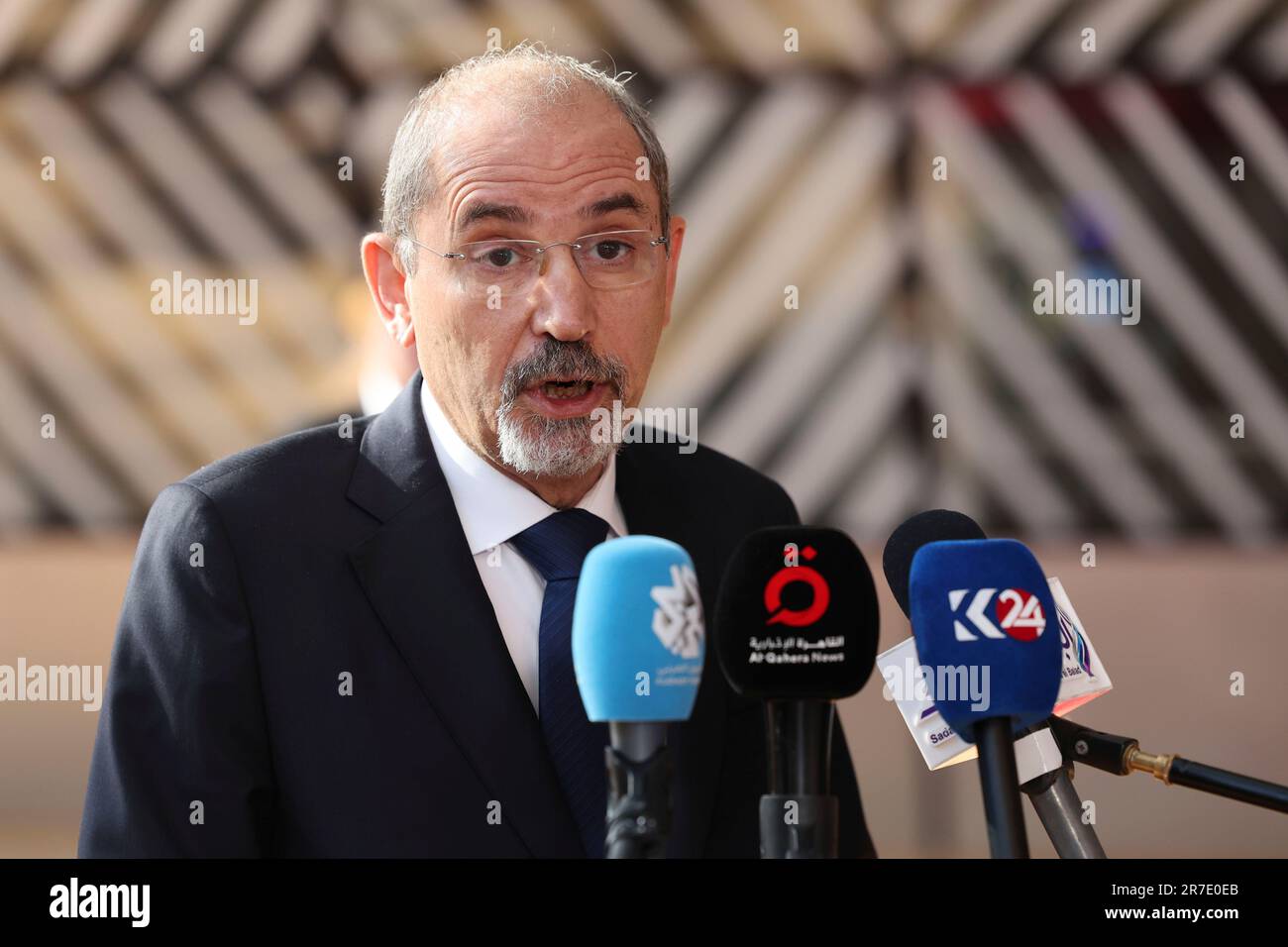 Jordan's Minister for Foreign Affairs Ayman Safadi speaks with the ...