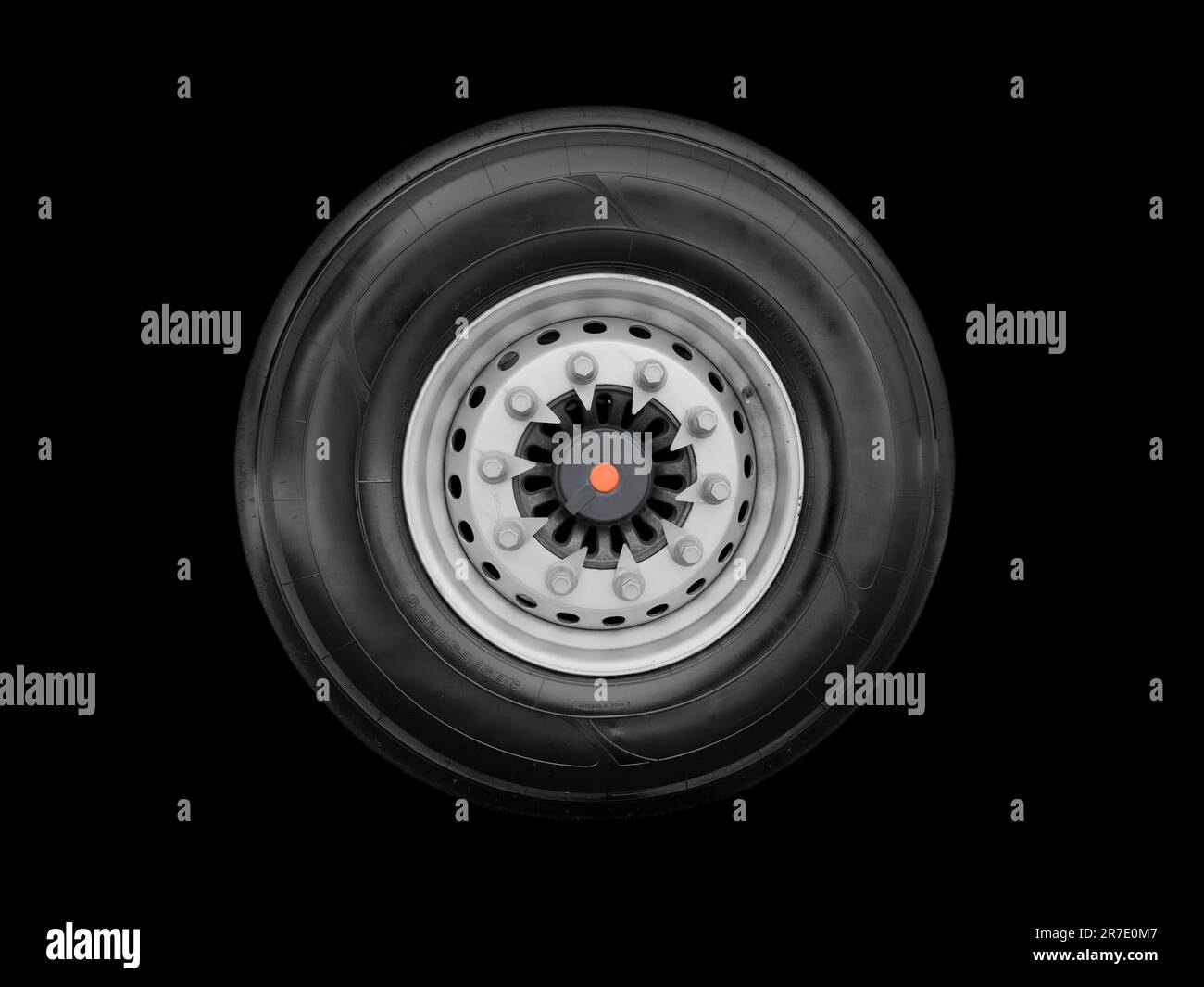 Truck alloy wheel and tyre isolated on black background. New alloy ...
