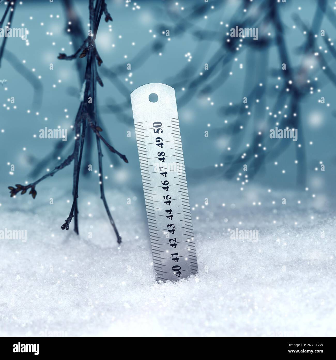 Metal ruler in the snow.The ruler shows the amount of snow in the ...
