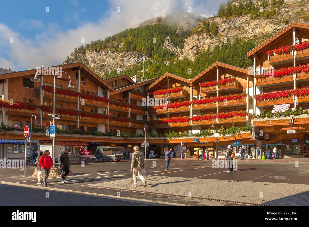 Zermatt, Switzerland - October 7, 2019: Town center street and railway ...
