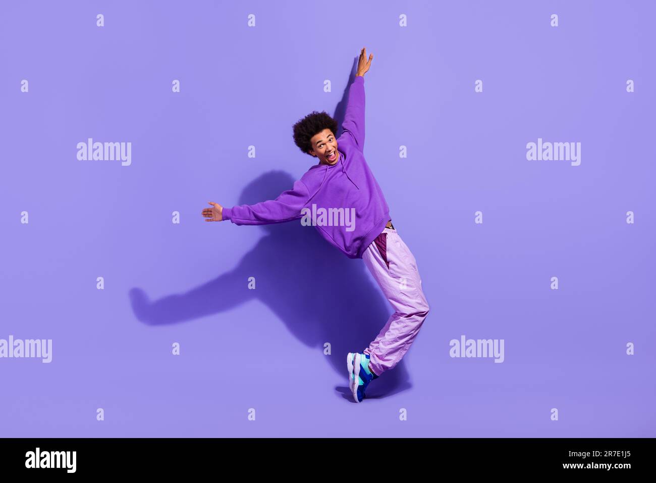 Full body cadre of funky millennial guy dance tiptoes crazy party ...