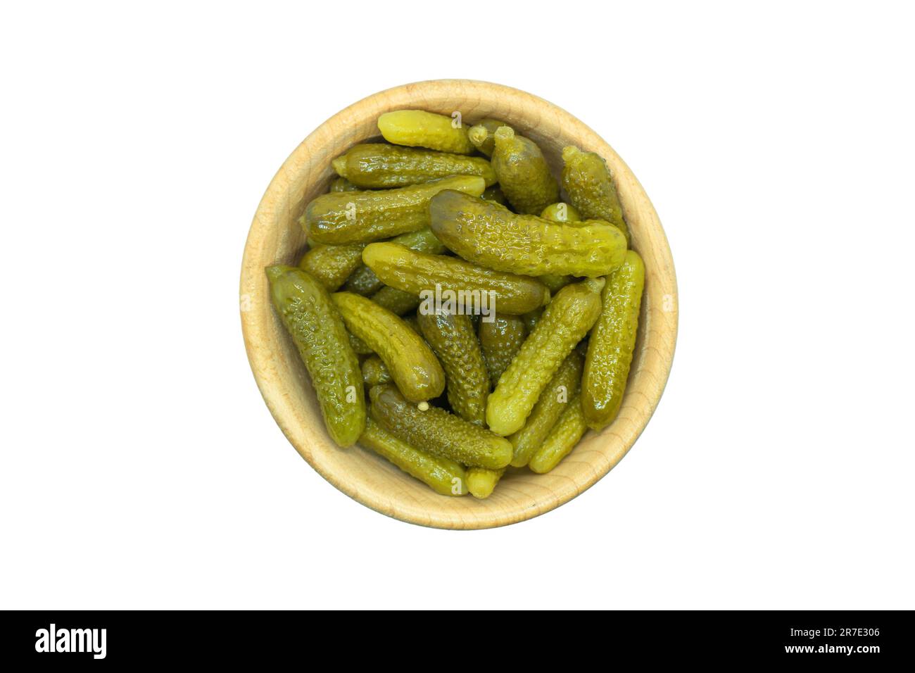 Bowl of tasty canned whole green cornichons isolated on a white ...