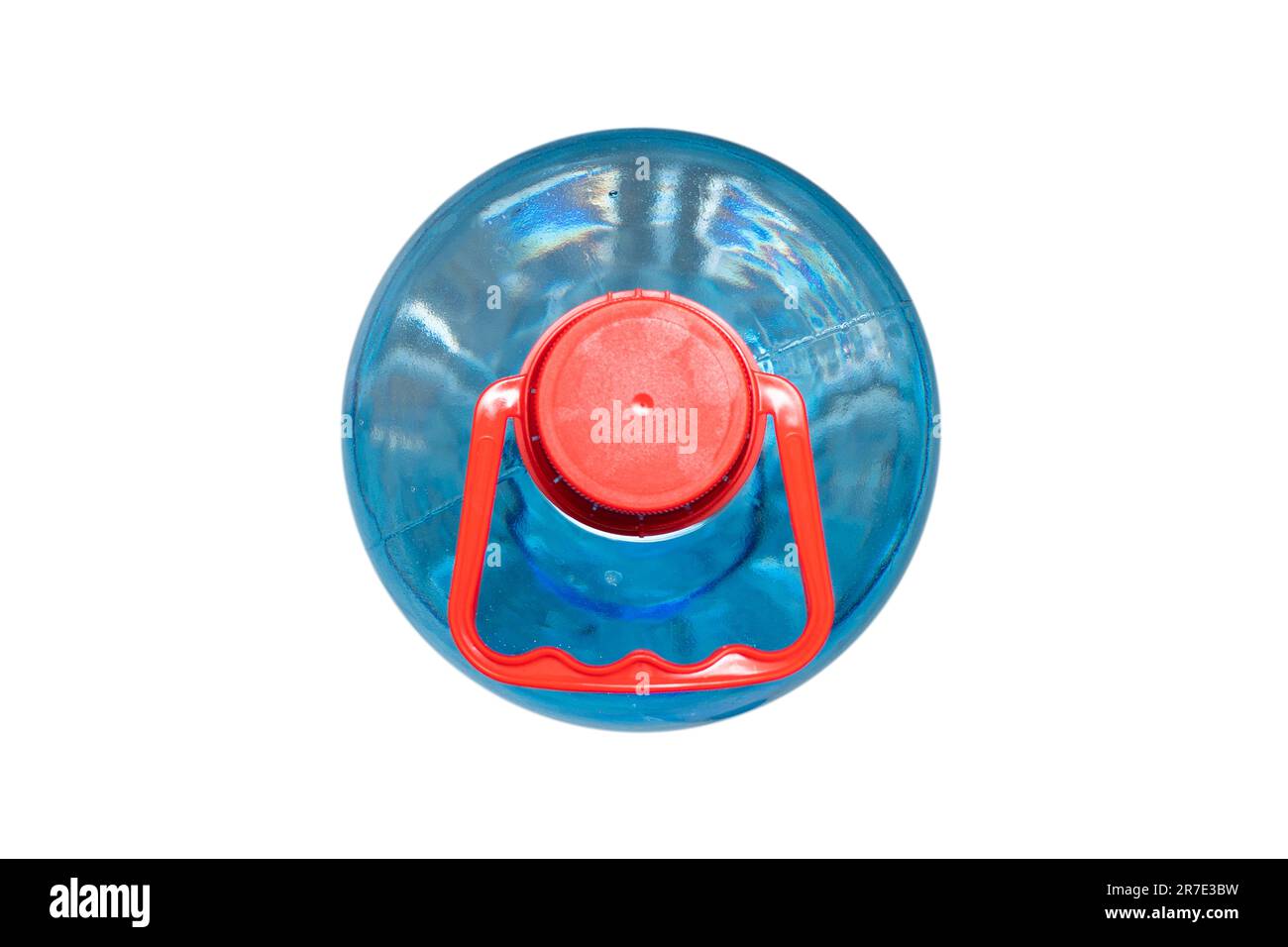 Blue plastic bottle red cap with still water isolated on white ...