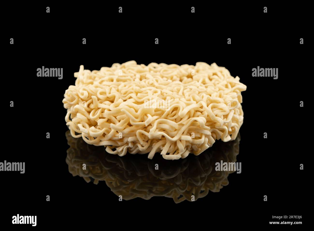 Texture of dry instant noodles isolated on black background. Raw dried ...