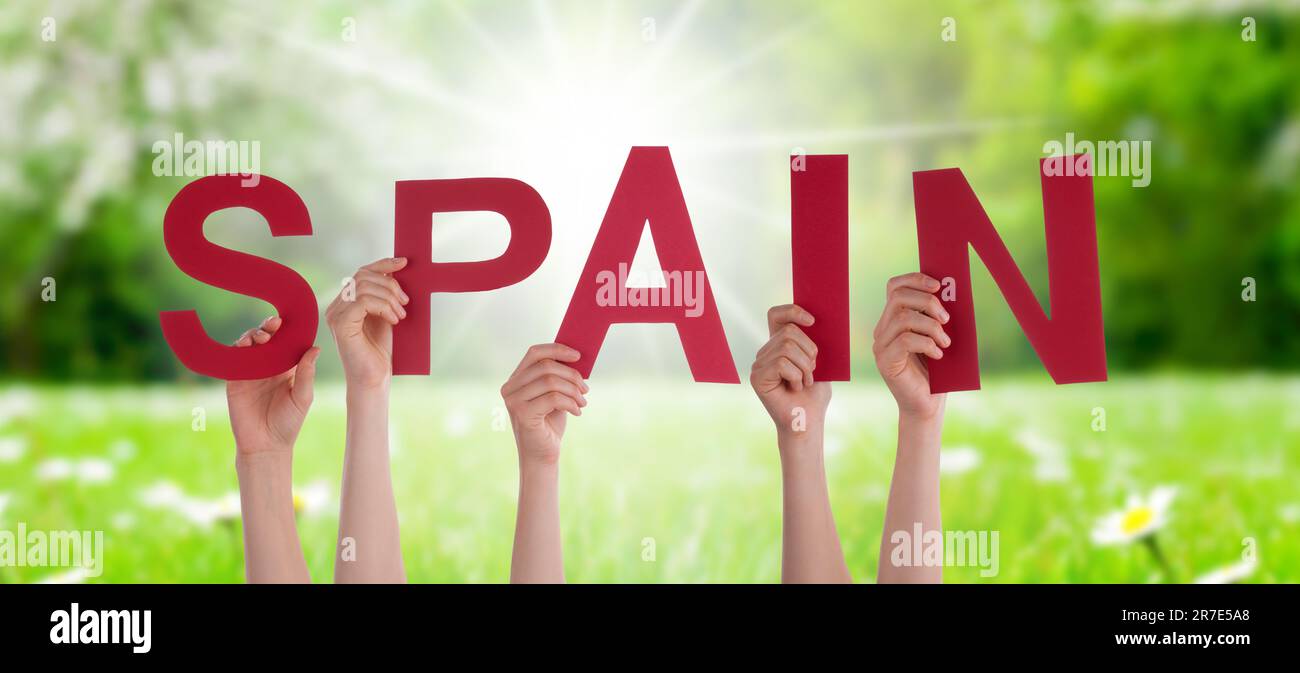 People Hands Building Word Spain, Grass Meadow Stock Photo - Alamy