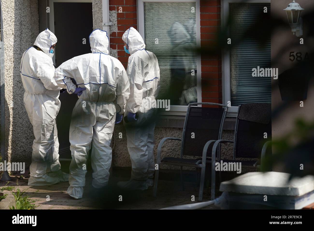 Garda forensics officers at the scene where the body of a woman was ...