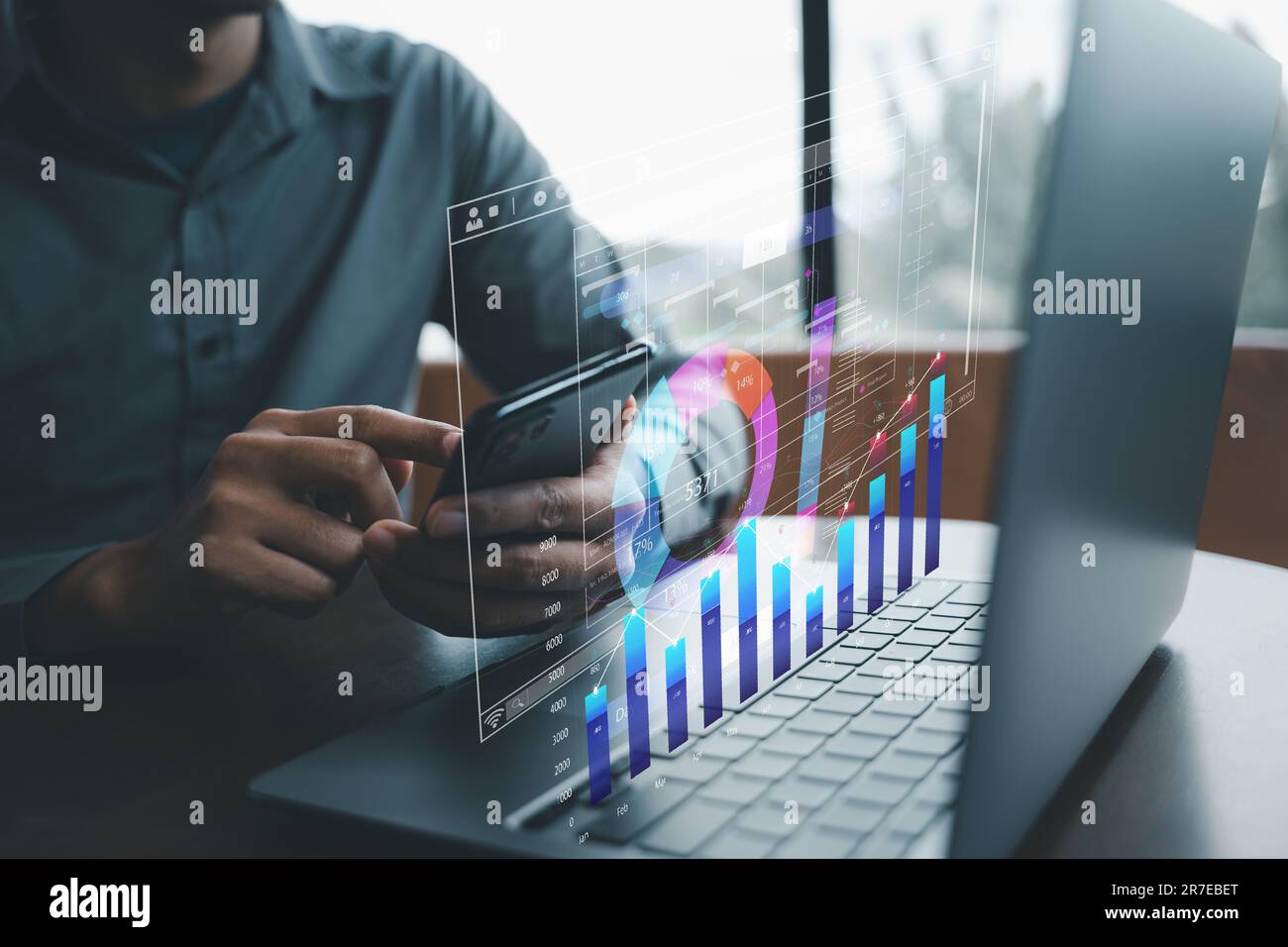 Business analyst using digital tools to analyze data for corporate ...
