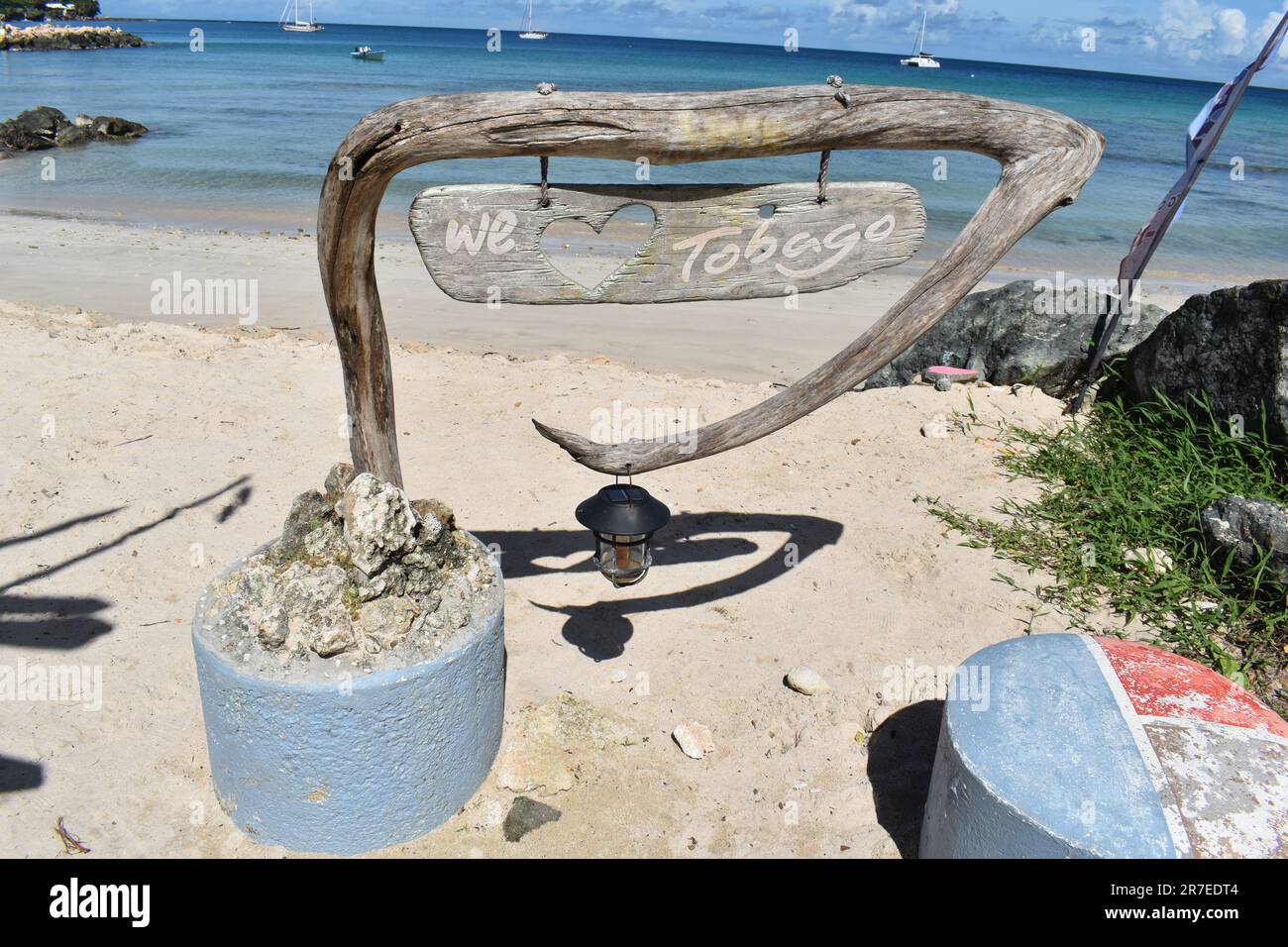 A 'We love Tobago' Sign on the seashore of the Swallow's Bay, Tobago ...