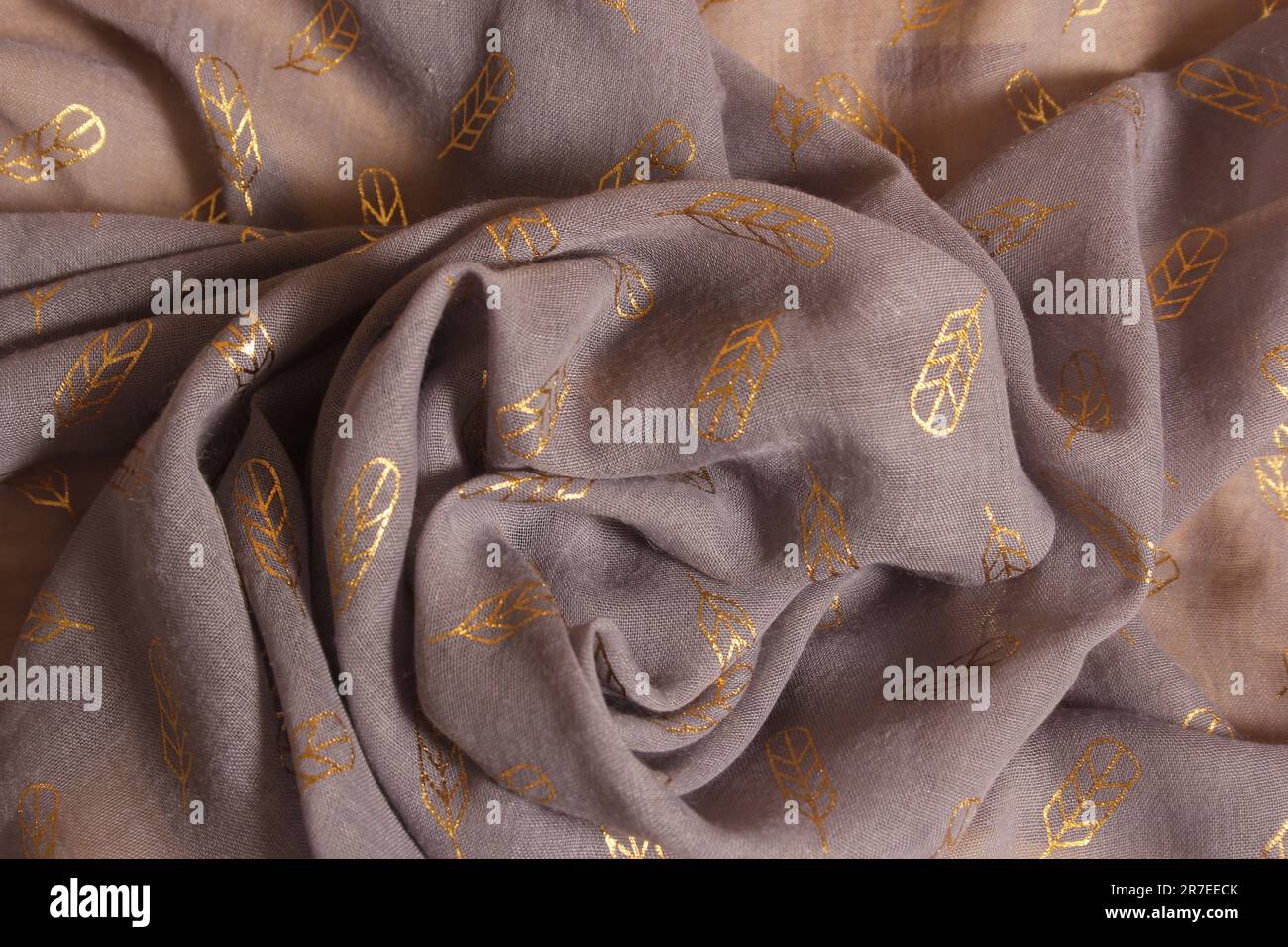 Pile of Gray and Gold Fabric overhead view Stock Photo - Alamy