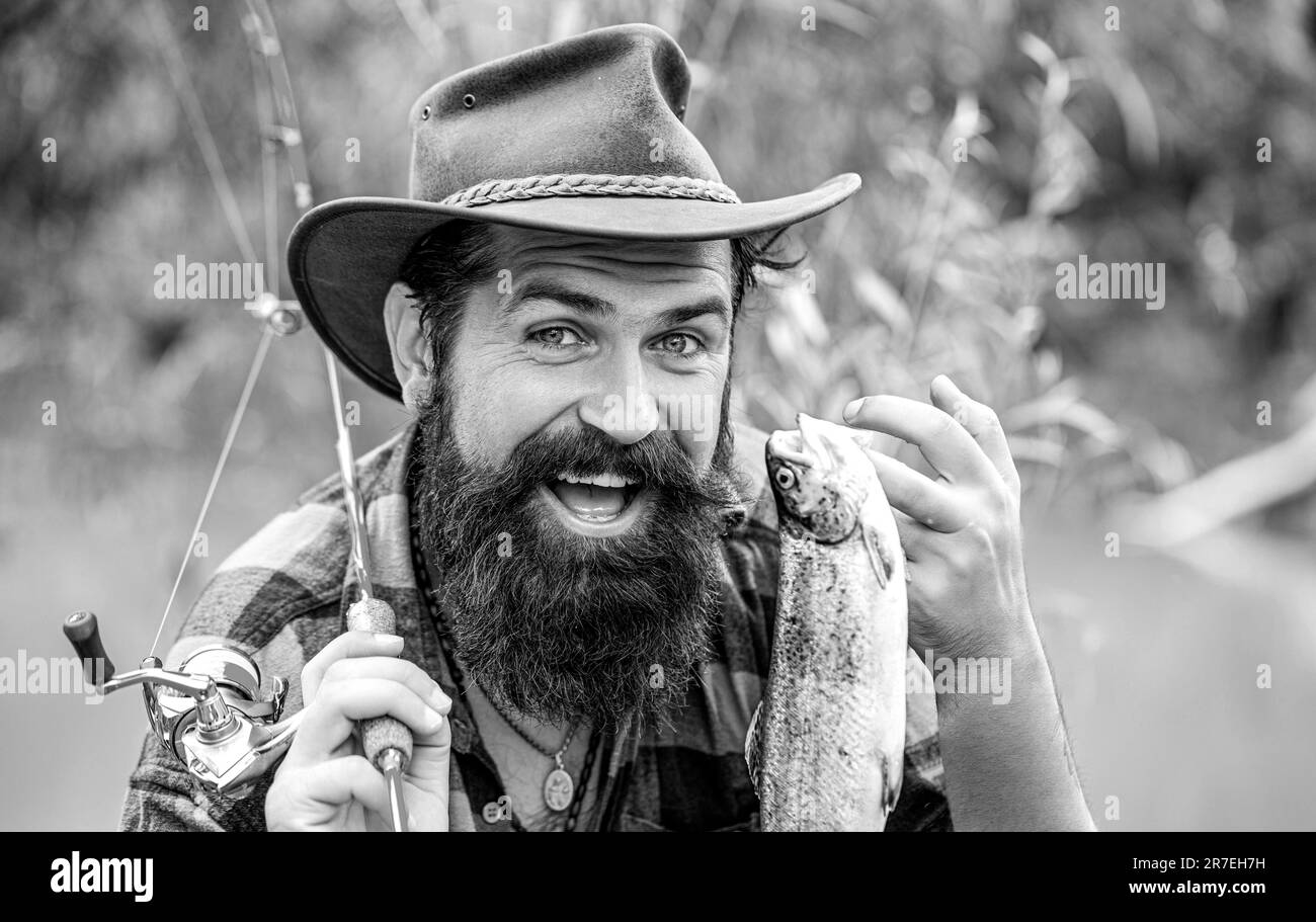 Fisherman and trout. Fishing backgrounds. Man hold big fish trout in ...