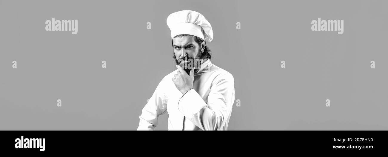 Cook hat. Serious cook in white uniform, chef hat. Portrait of a ...