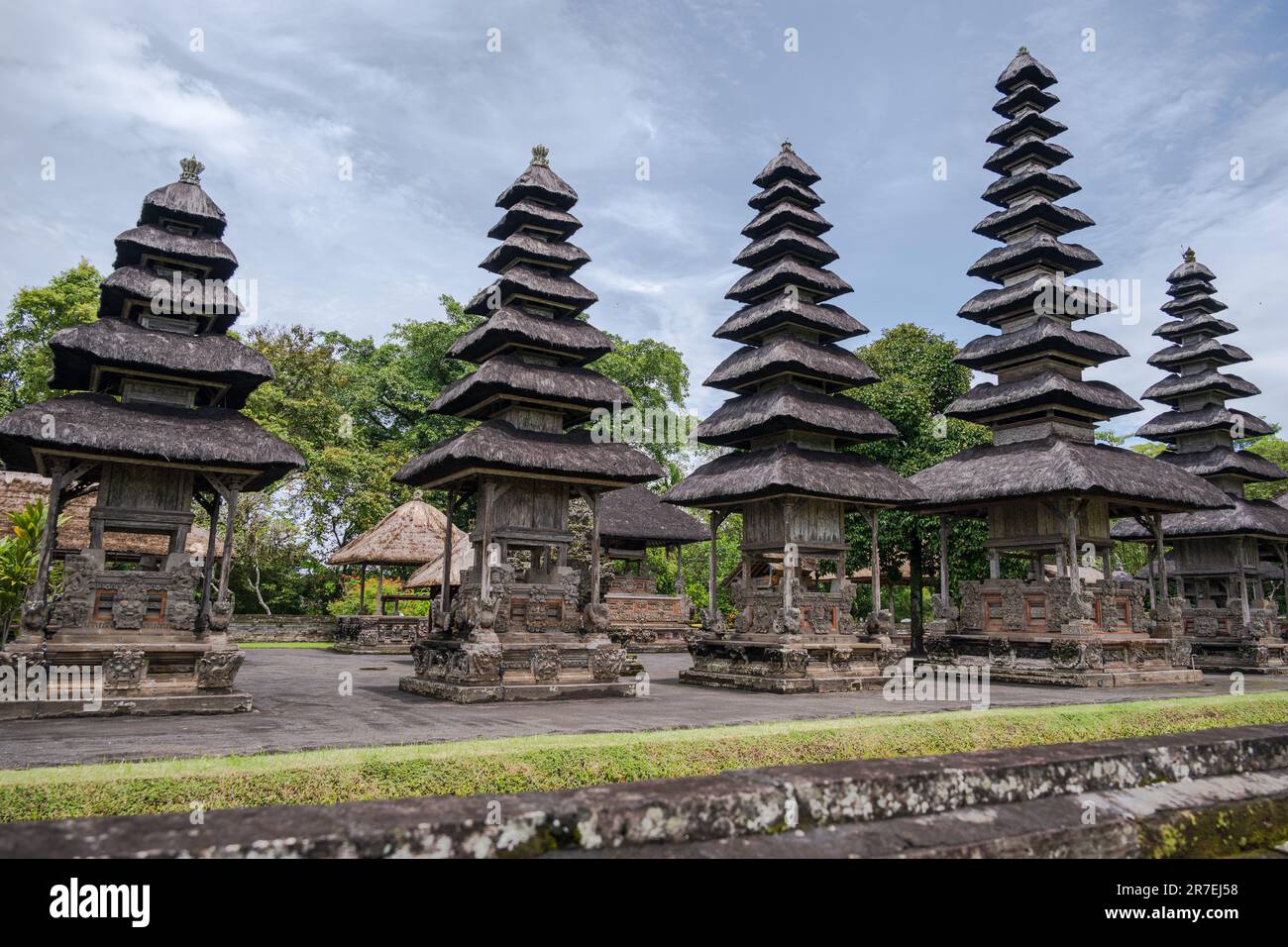 A wide angle photo of pagoda-like structures at the Taman Ayun Temple ...