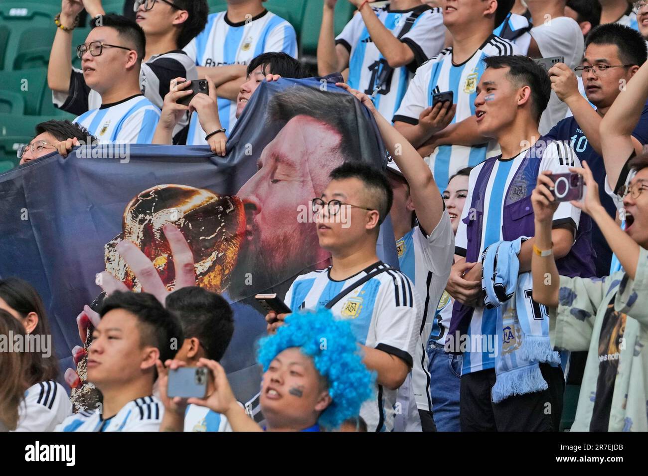 Fans display a large banner of Lionel Messi prior to the start of the ...