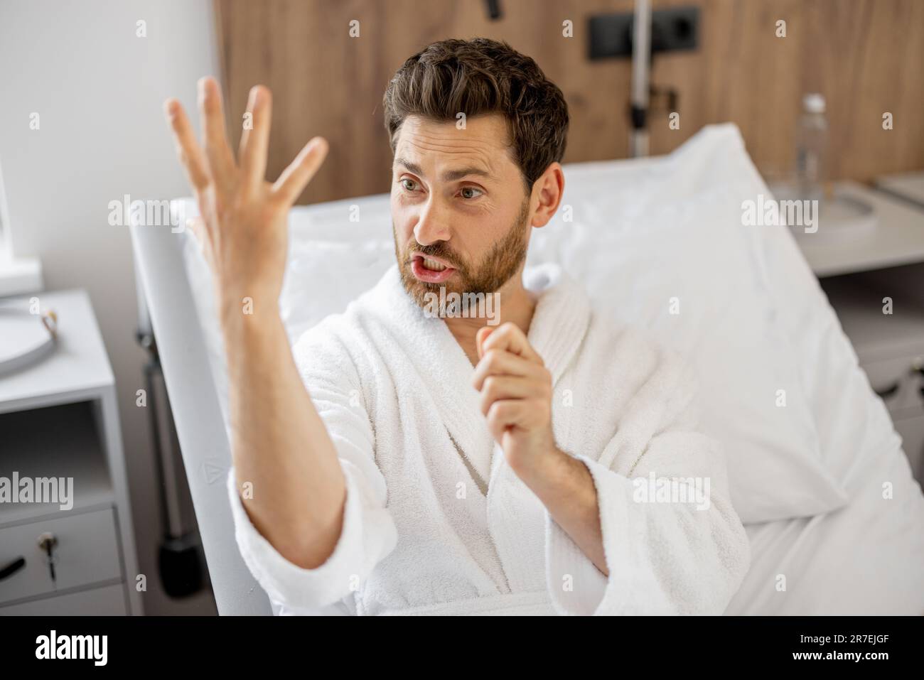 Male patient with healed arm in medical ward Stock Photo - Alamy