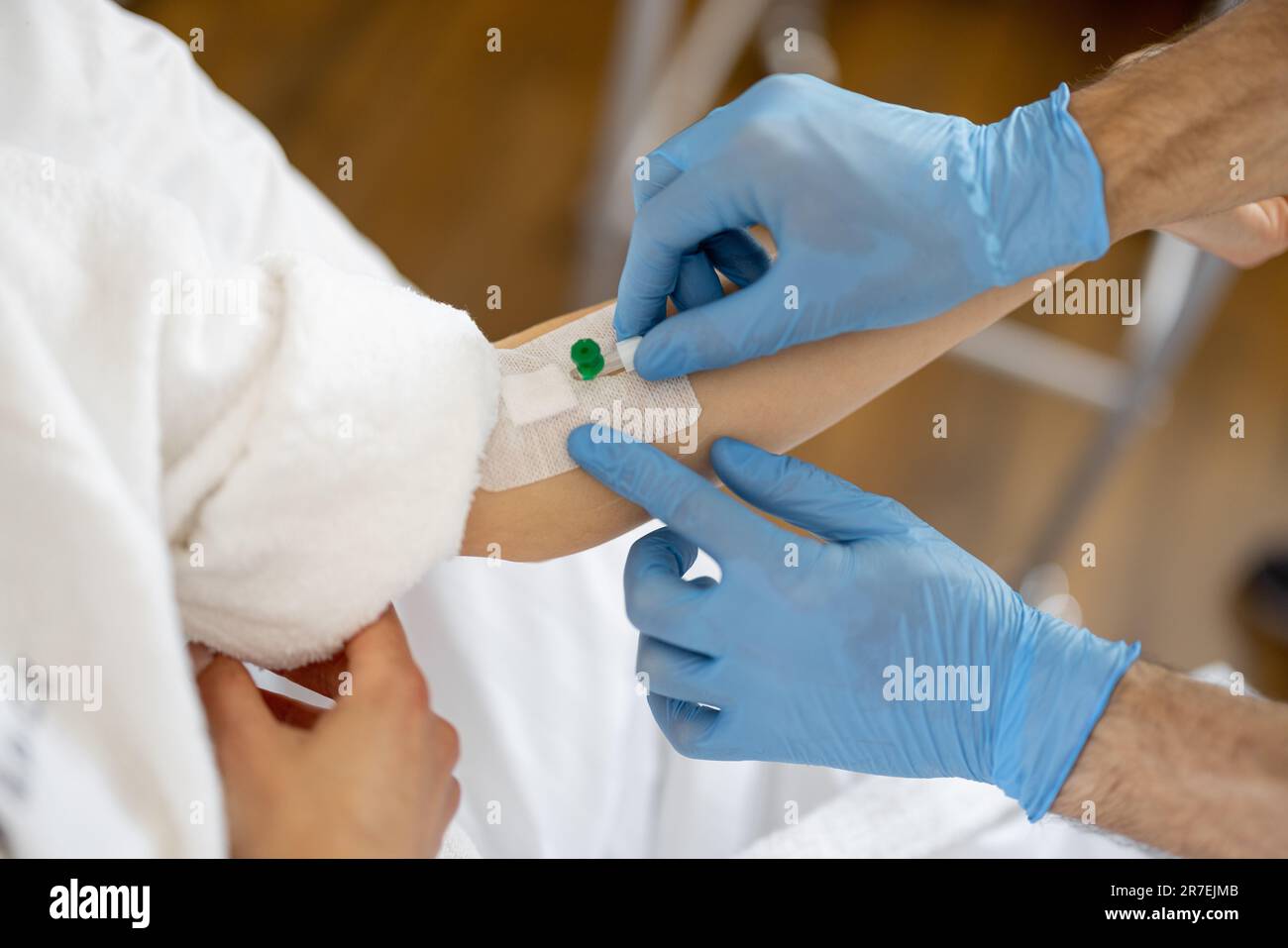 Nurse inserts catheter to female patient, close-up Stock Photo - Alamy