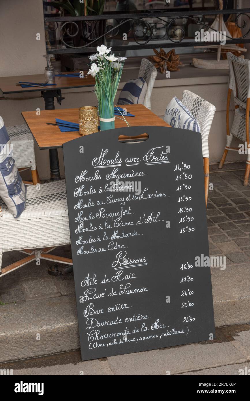 Northern France, Europe. EU. 2023. Menu board leaning on a table with ...