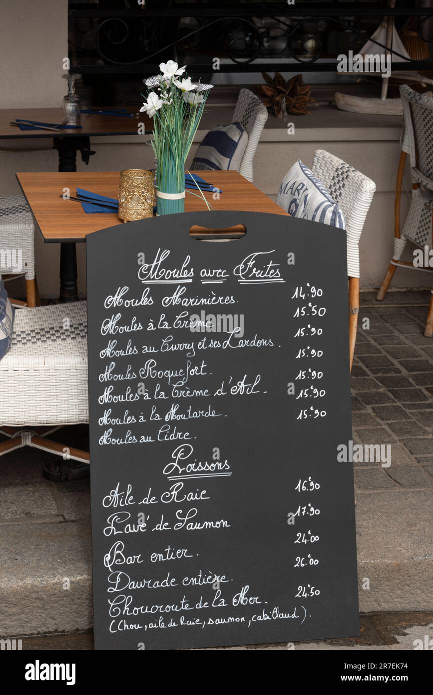 Northern France, Europe. EU. 2023. Menu board leaning on a table with ...