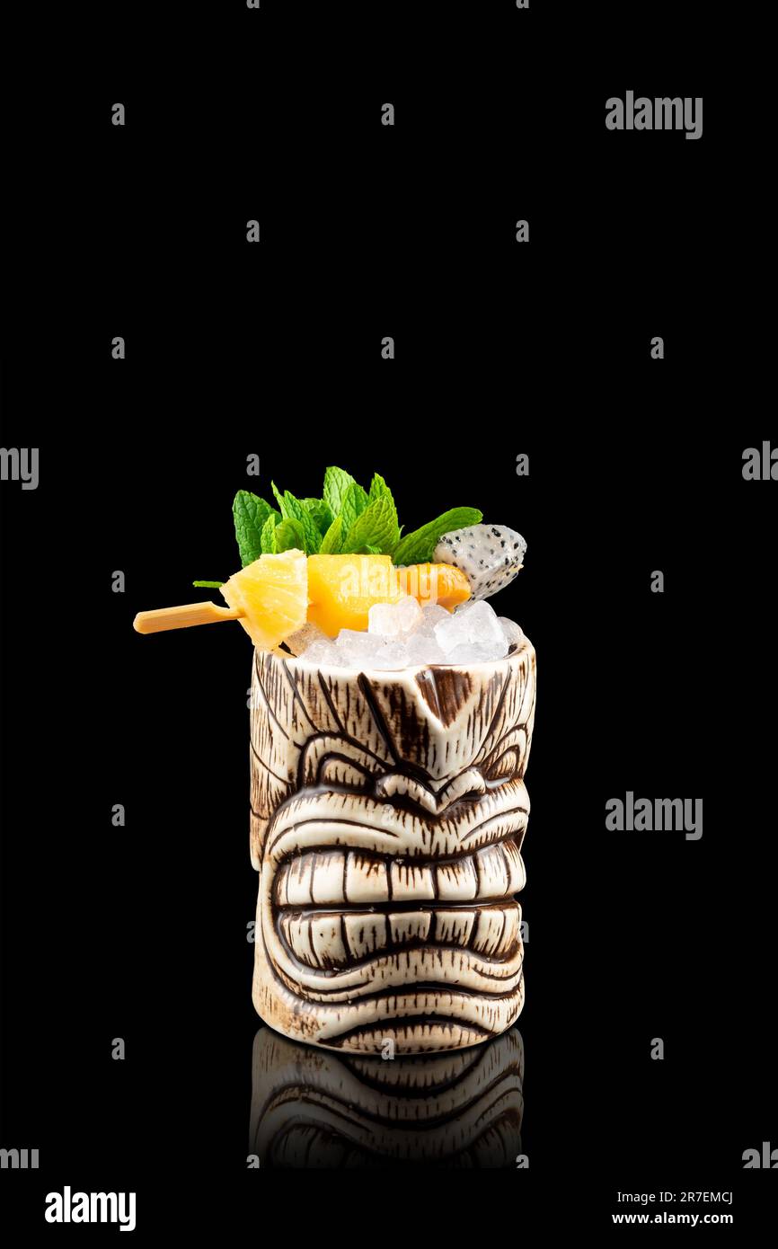 Fresh Zombie Tiki cocktail with ice in ceramic cup. Fruity frozen ...
