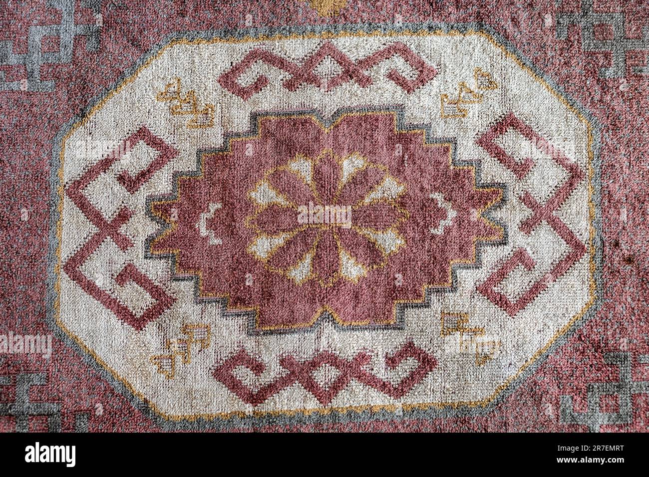 Colorful vintage surface with an old oriental pattern. The background ...