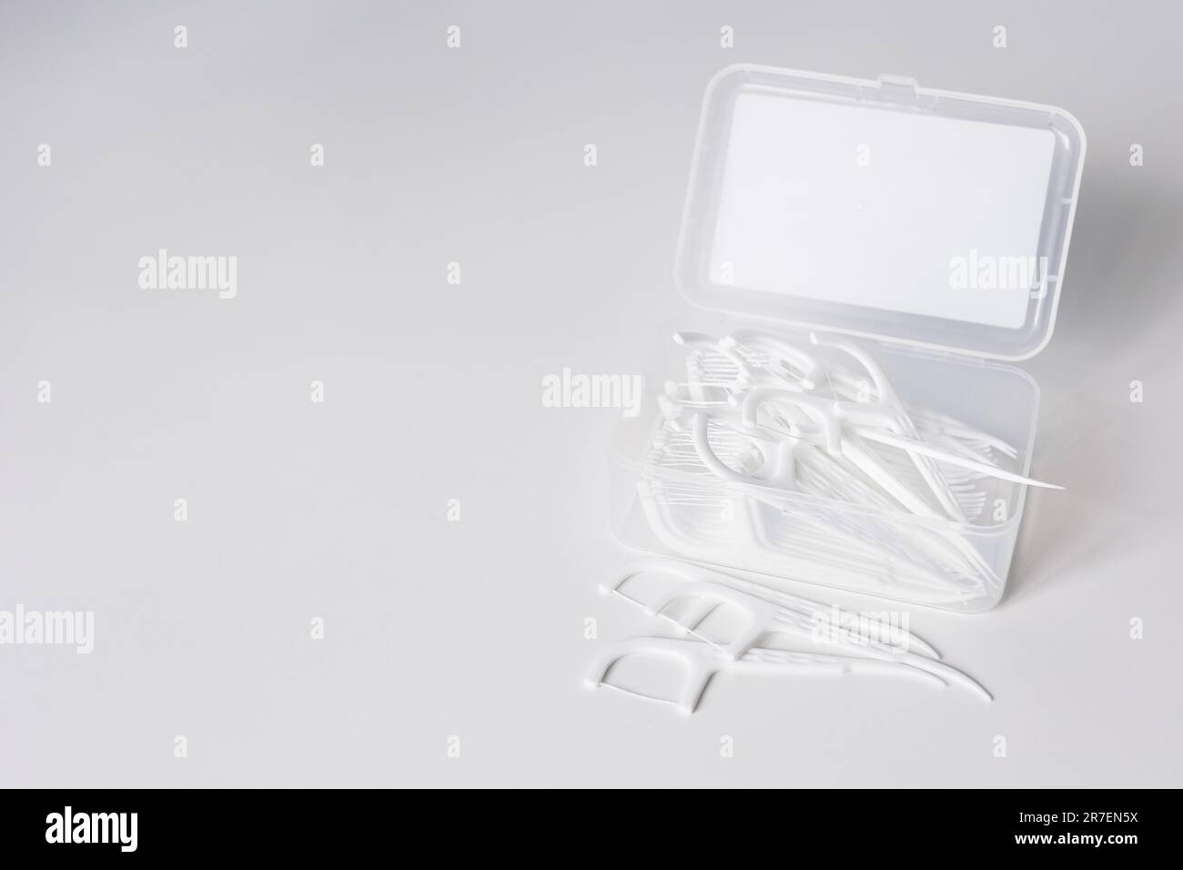 Dental toothpicks with dental floss in box on white background Stock ...