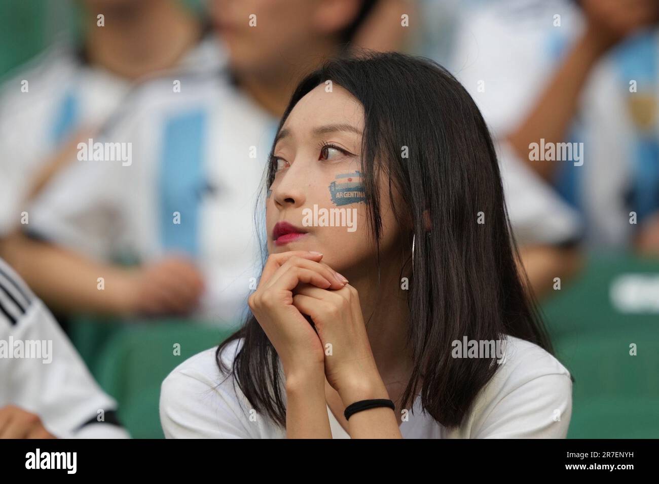 Beijing, China. 15th June, 2023. A fan reacts ahead of an international ...