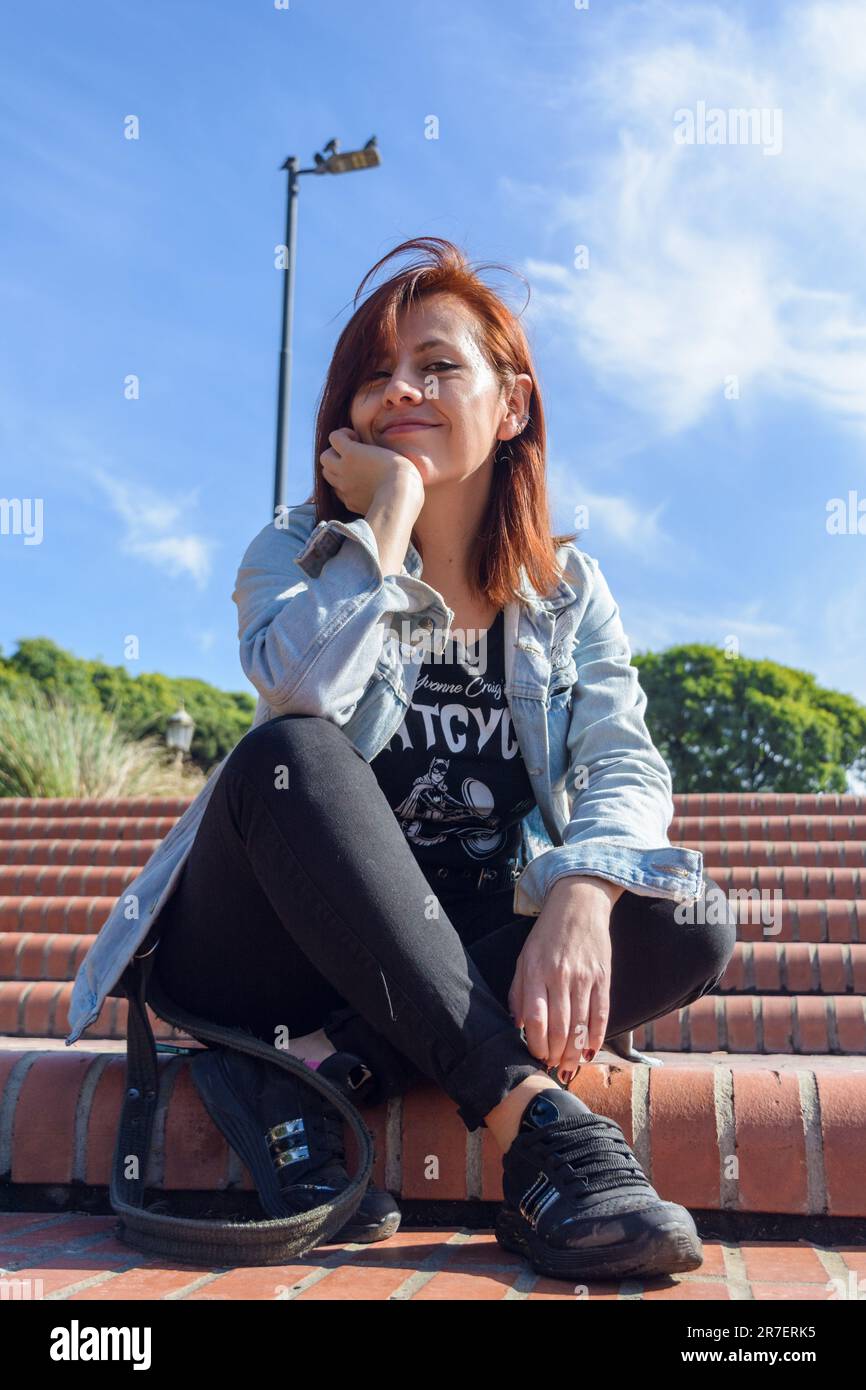 Smiling blonde girl sitting crossed hi-res stock photography and images ...