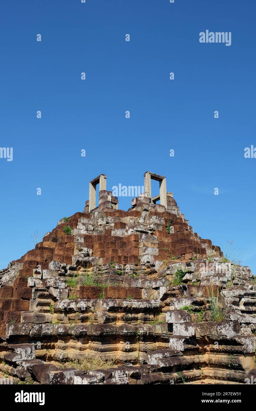 Medieval ruins of an ancient stone pyramid's top in Cambodia, set ...