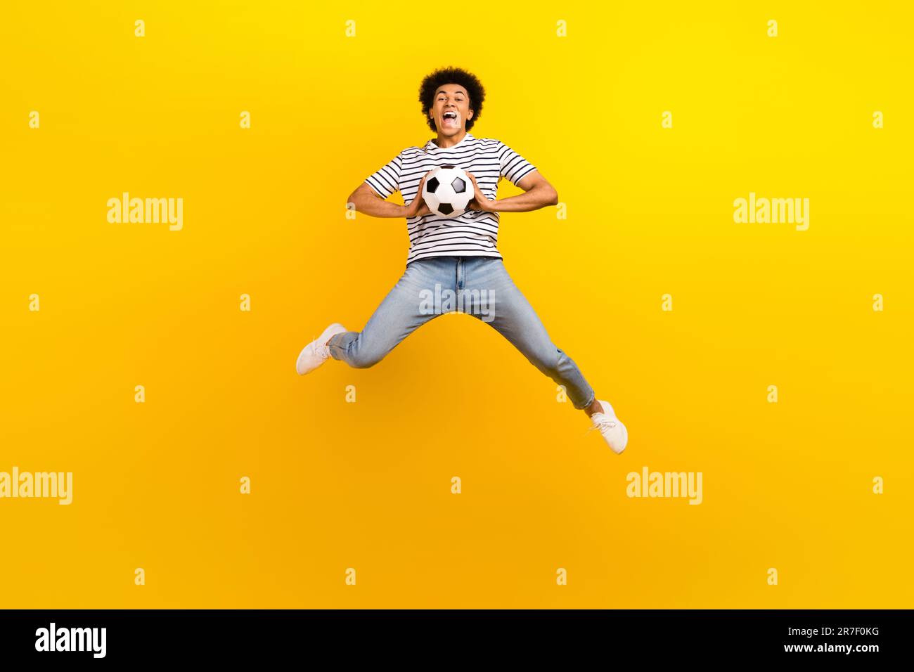 Full body photo view of young handsome goalkeeper guy jump fun ...