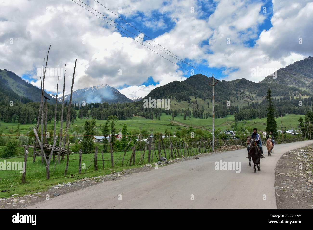 Pahalgam, India. 15th June, 2023. Visitors enjoy horse riding at the ...