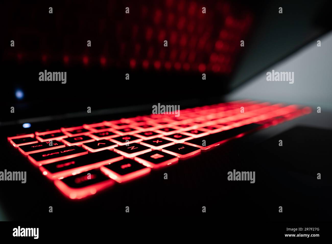 Gaming laptop keyboard with led red light Stock Photo - Alamy