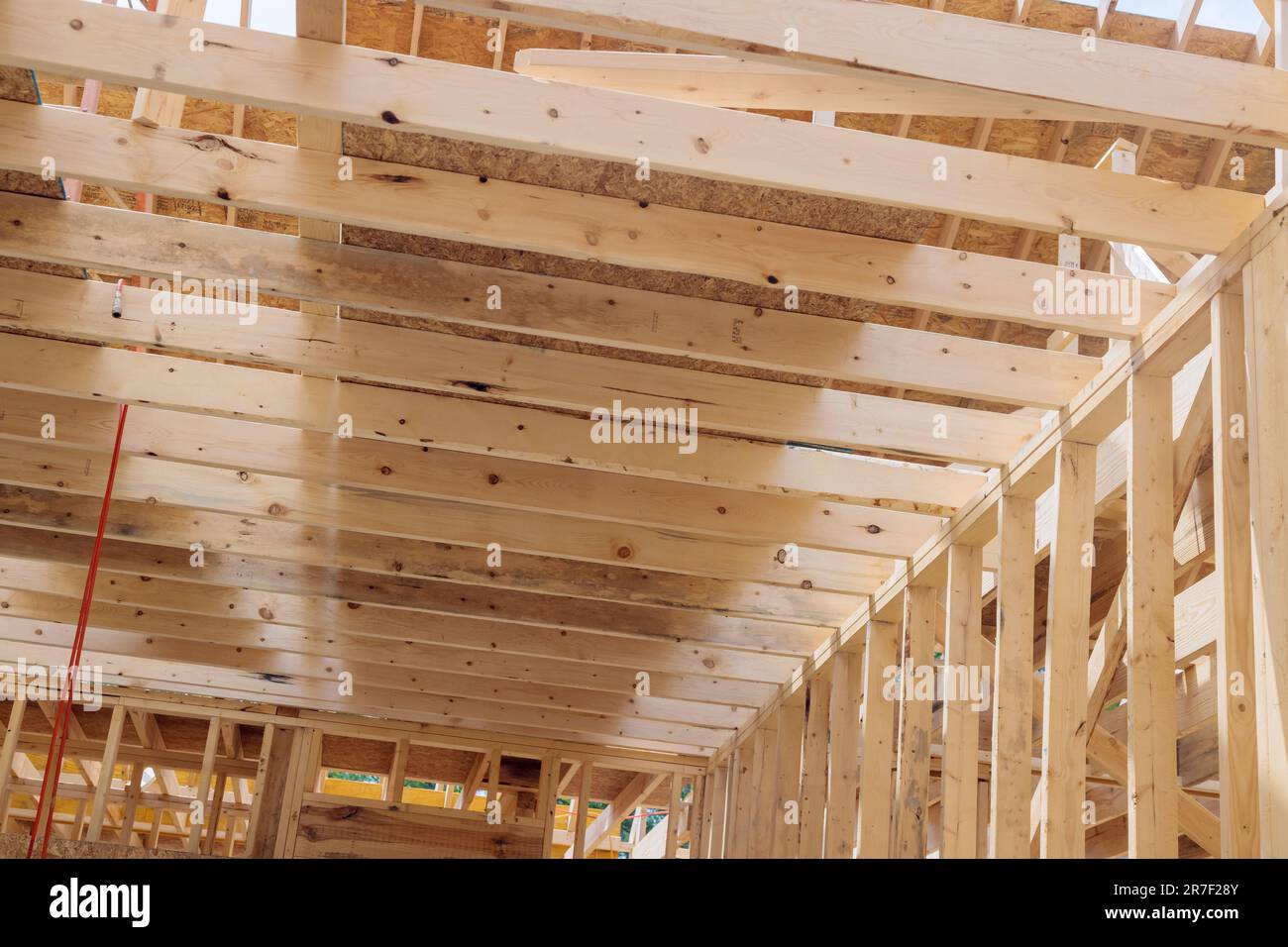 Trusses are often used in construction of wooden houses to provide ...
