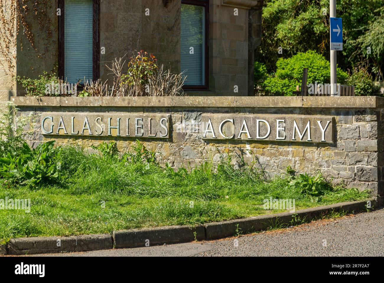 A sign at the entrance to galashiels academy Stock Photo - Alamy