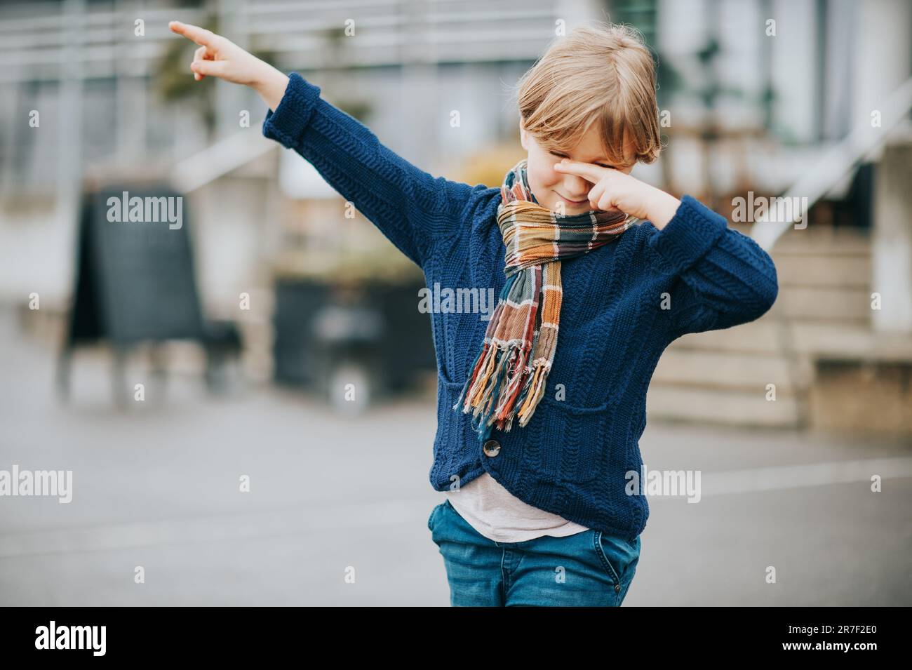 Little boy making dab dance outdoors Stock Photo - Alamy