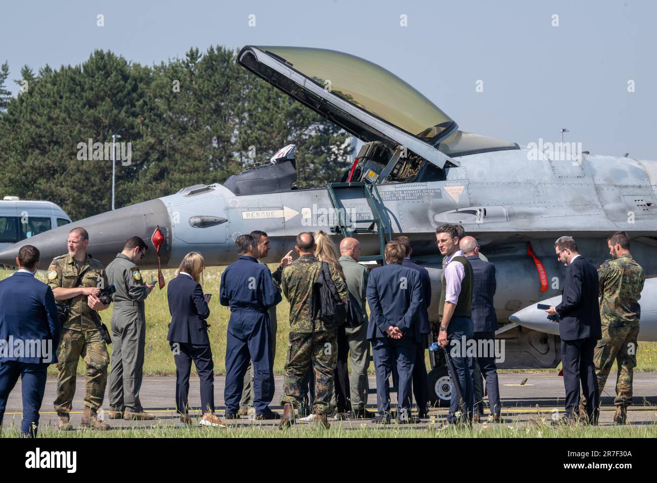 Graben, Germany. 15th June, 2023. Visitors stand in front of a Greek "F ...