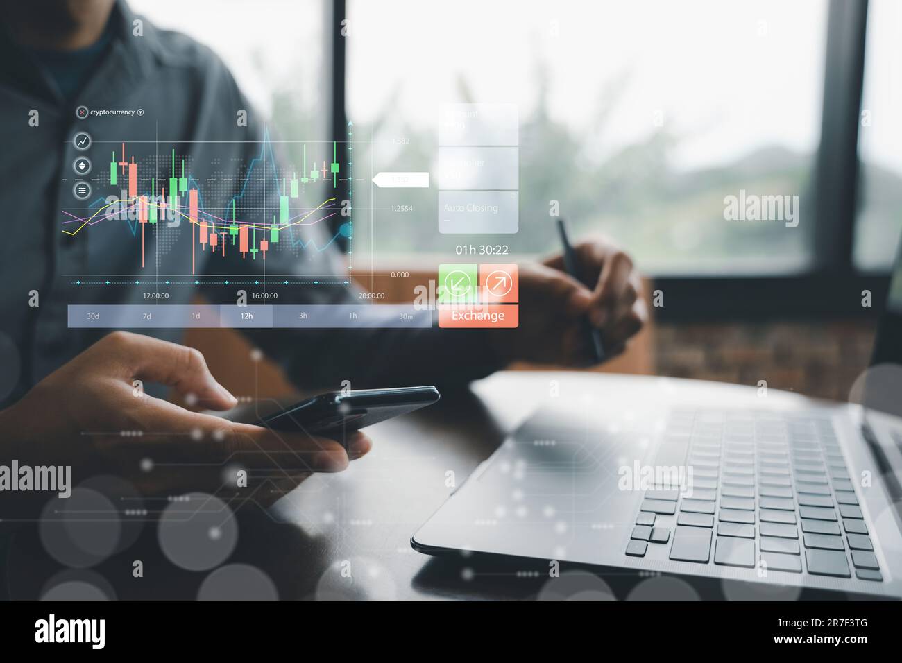 Man monitoring stock market trends and trading activities Stock Photo ...