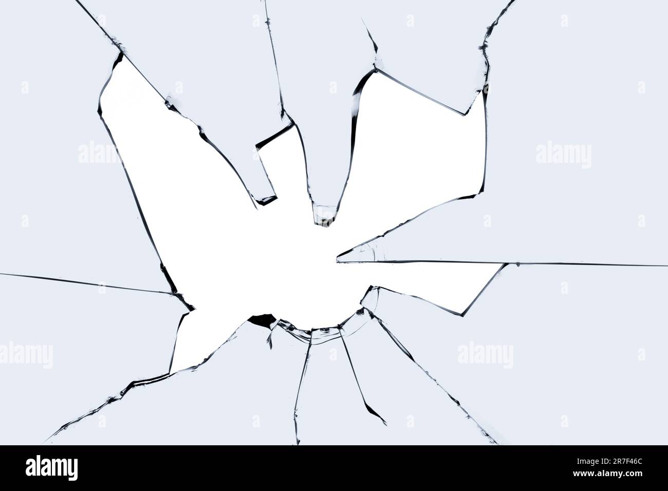 A broken window with cracks and pieces of sharp glass. Cracked texture ...